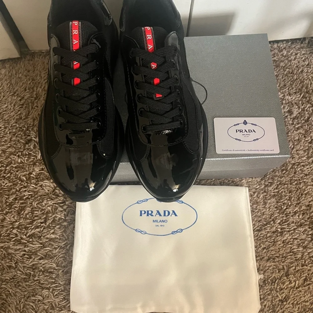 Prada | Shoes | Prada Black Patent Leather Sneakers With Red Tongue ...